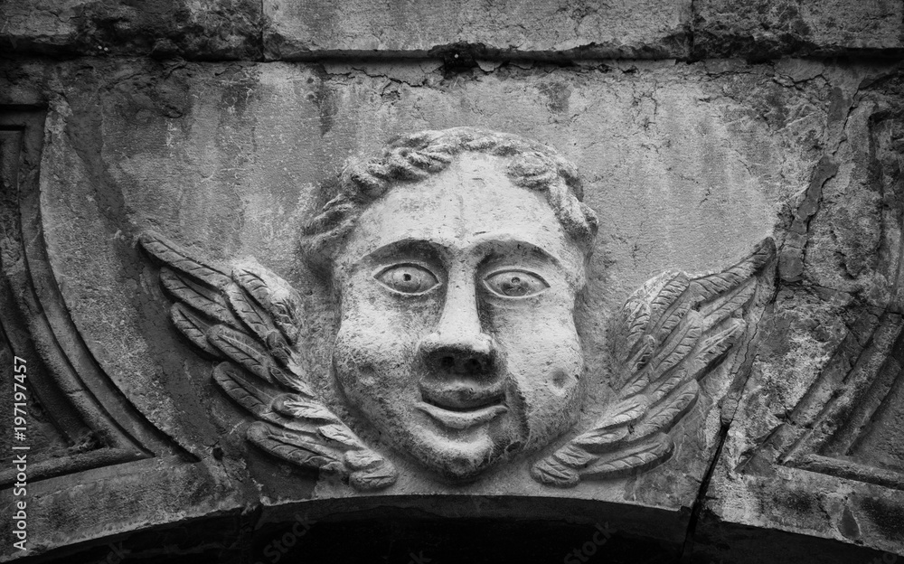 Foto de Smiling face of angel on the front of Cathedral of Notre Dame ...