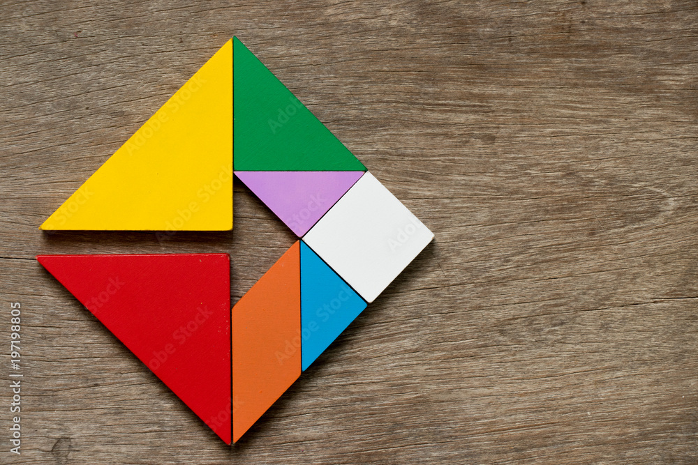 Colorful tangram puzzle in square with inside arrow direction shape on ...