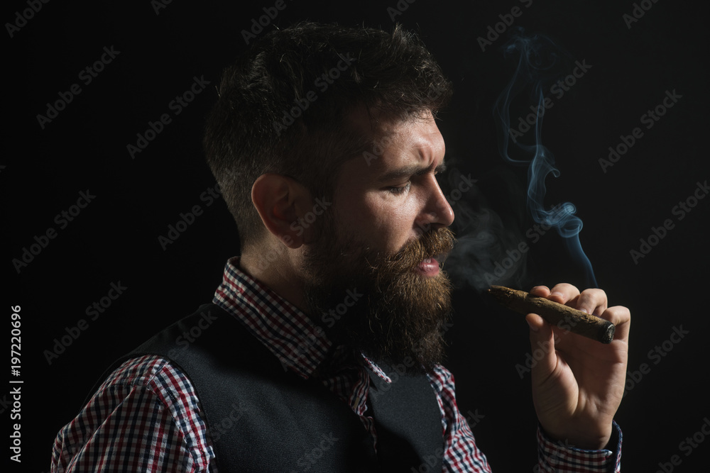 Bearded man with cigar. Barber shop. Fashionable bearded men ...