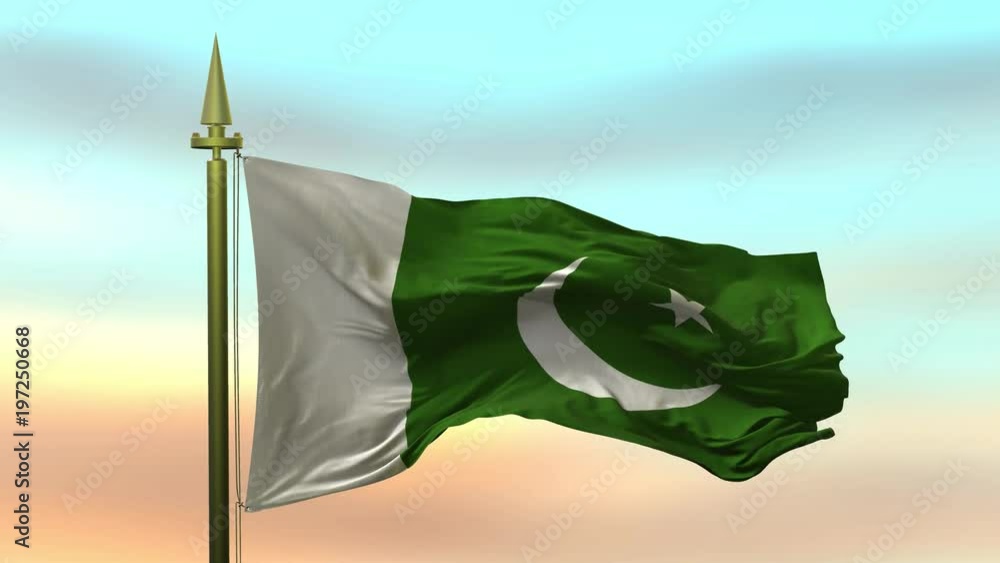 National Flag of Pakistan waving in the wind against the sunset sky ...