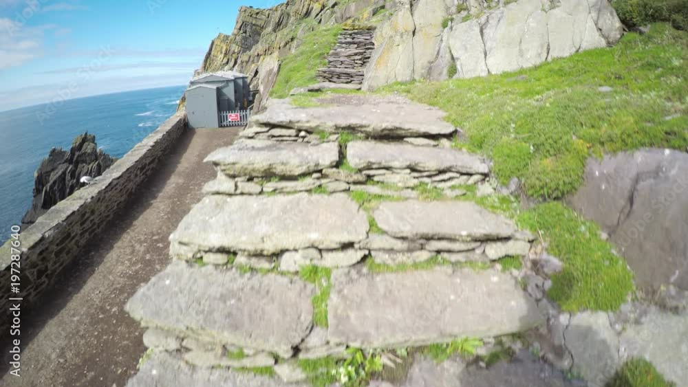 Woman Moving On Old Stone Steps Of Skellig Michael Stock Video | Adobe ...