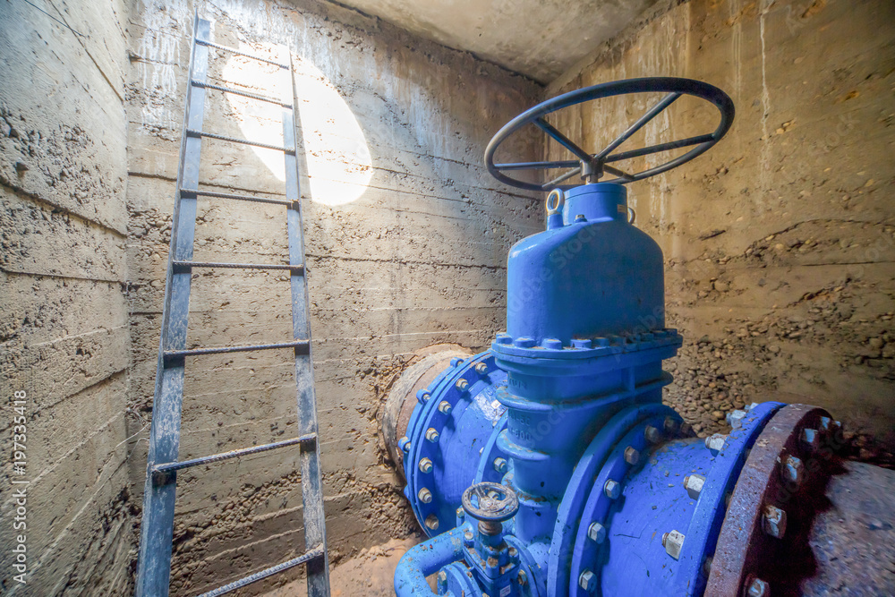 Large valves on the pipeline. Stock Photo | Adobe Stock