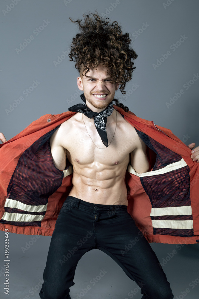 Young and attractive and muscular ginger man smiling Stock Photo ...