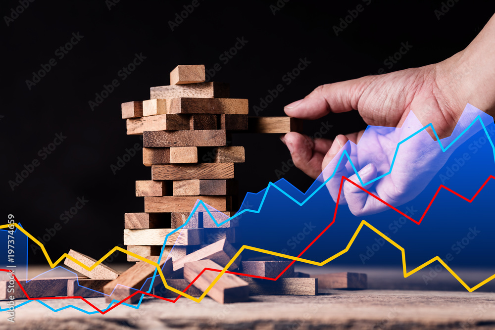 risk reward in business planning and analyzing with hand and graph ...