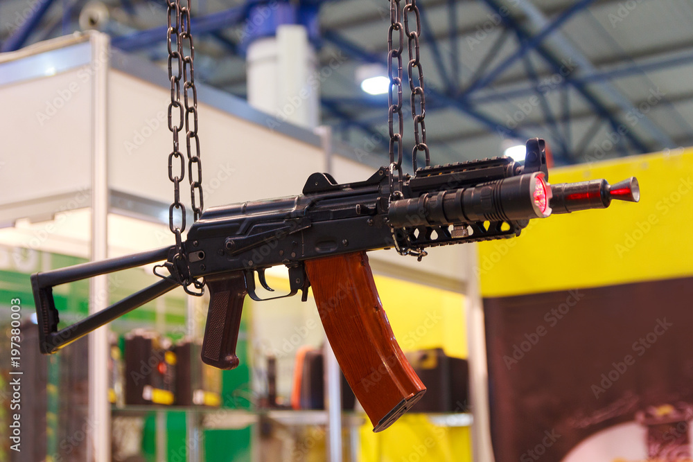 Kalashnikov automatic with a body kit in the shop window. Weapons Stock ...