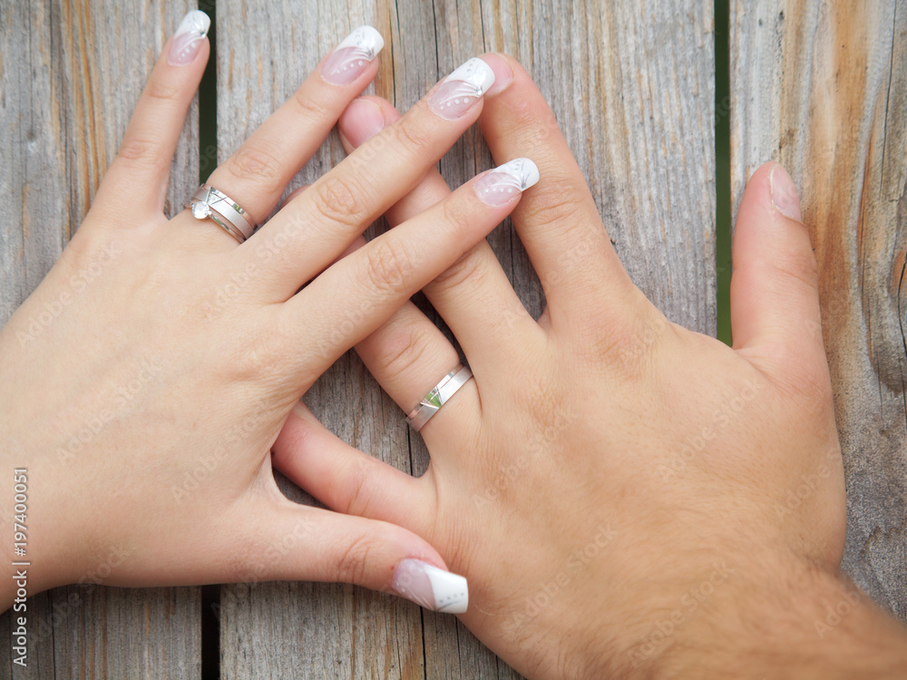 still life two hands with wedding rings Stock Photo | Adobe Stock