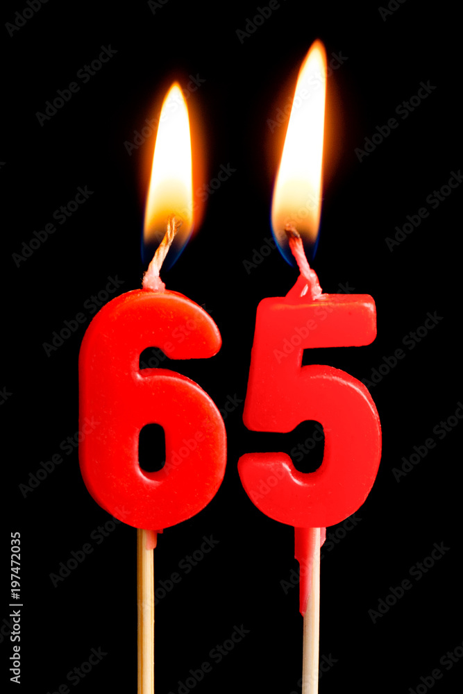 Burning candles in the form of 65 sixty ive figures (numbers, dates ...