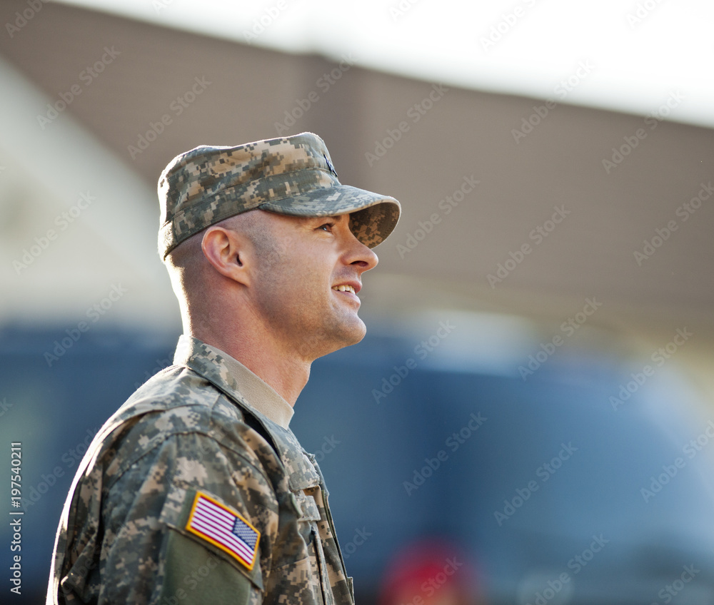 Smiling male army soldier in uniform. Stock Photo | Adobe Stock