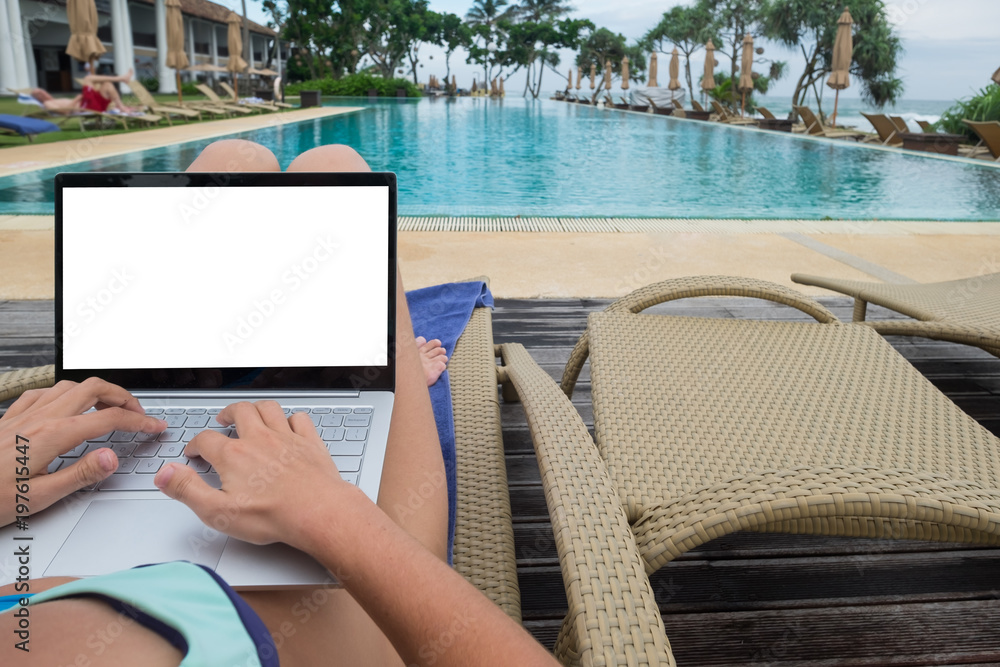 Recreational entrepreneur. Woman with laptop working during vacation ...