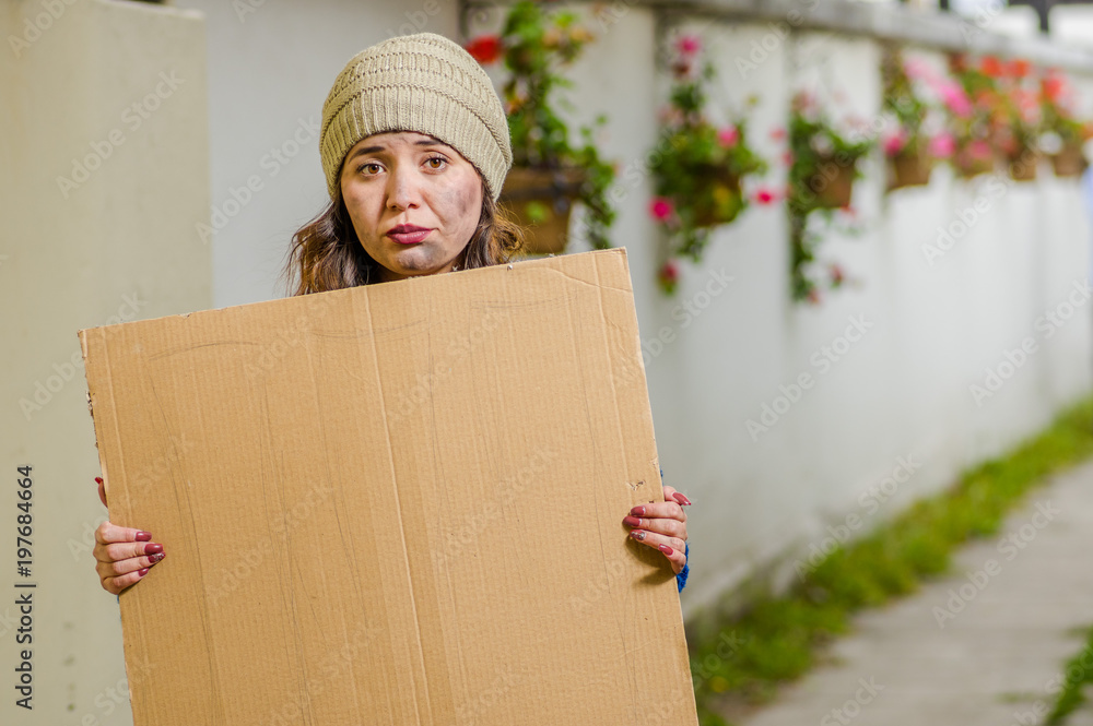 Homeless Holding Sign