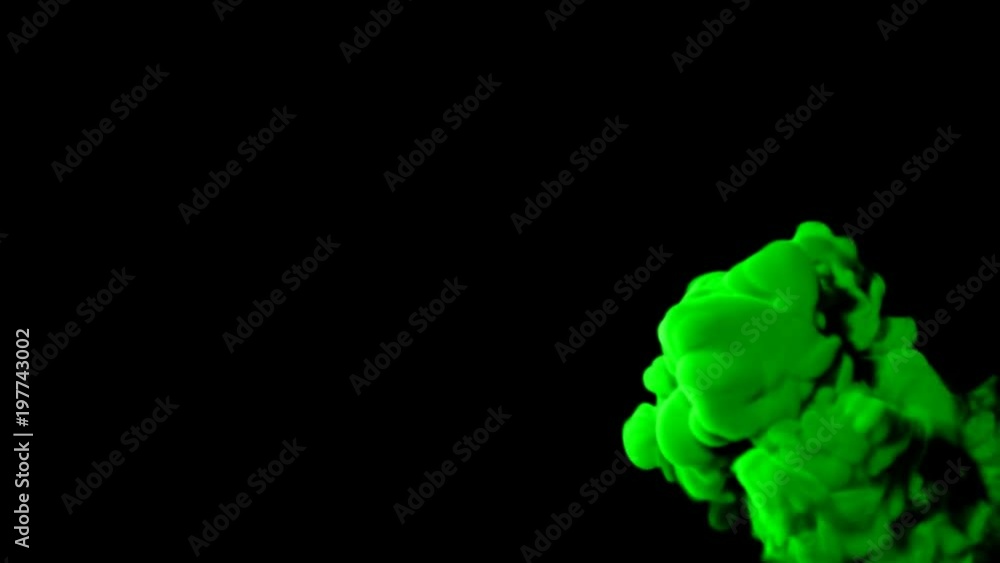 Abstract stylized Green ink drop in water on a black background for ...