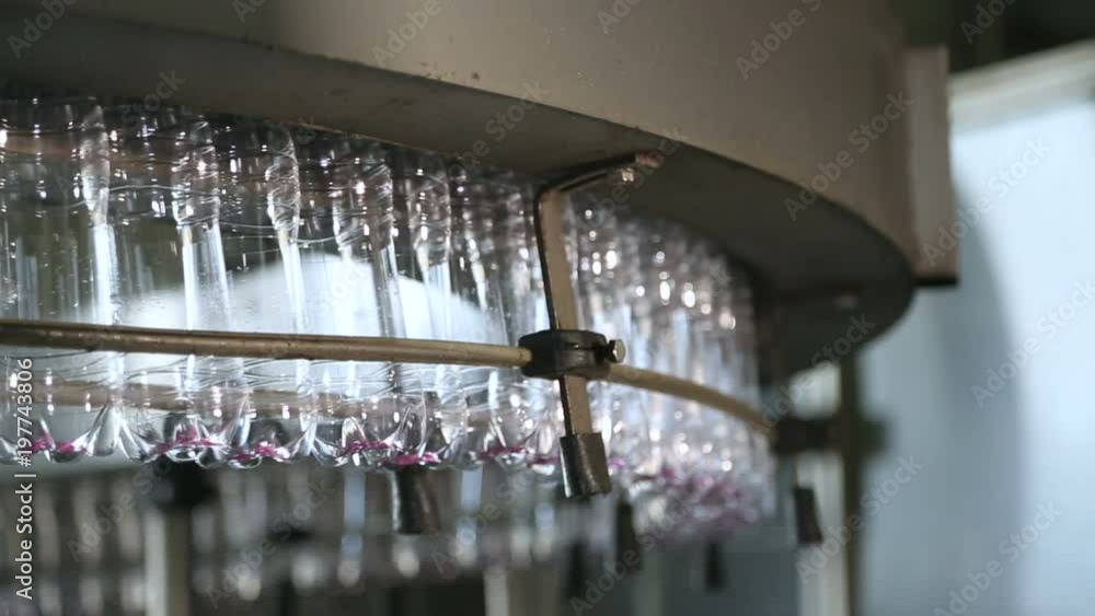 Plastic bottle manufacturing line. Plastic molding bottling factory ...