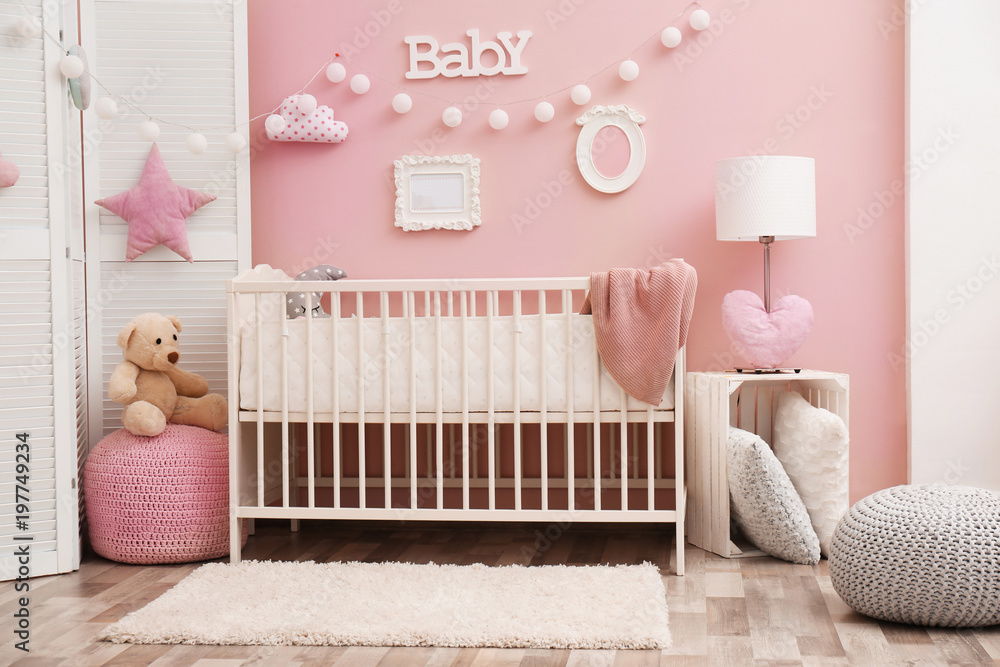 Beautiful interior of baby room with crib Stock Photo | Adobe Stock