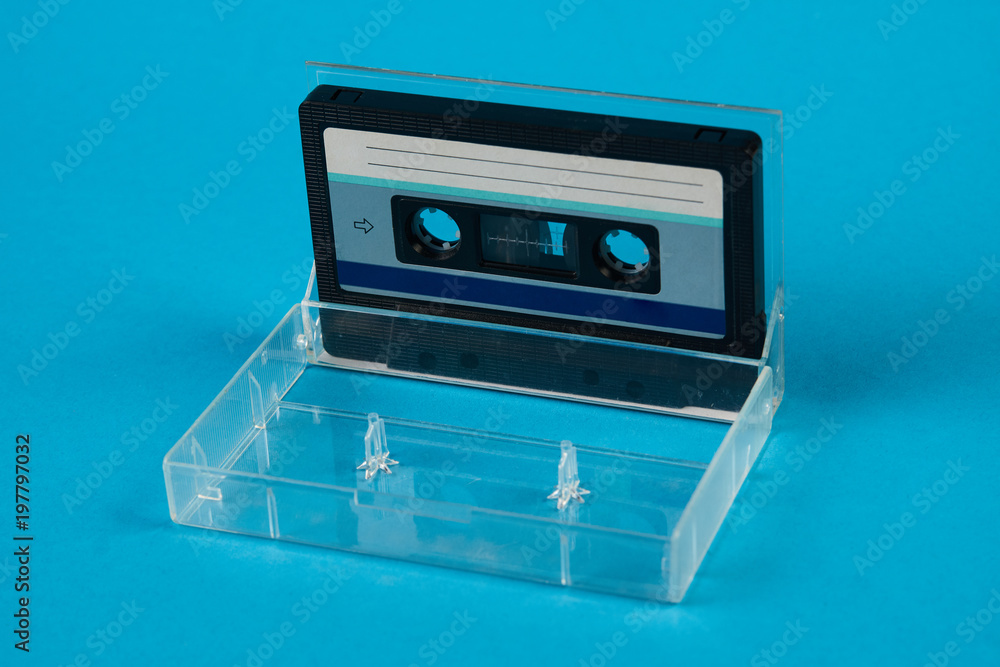 Blank cassette tape box on blue background. Vintage cassette tape case ...