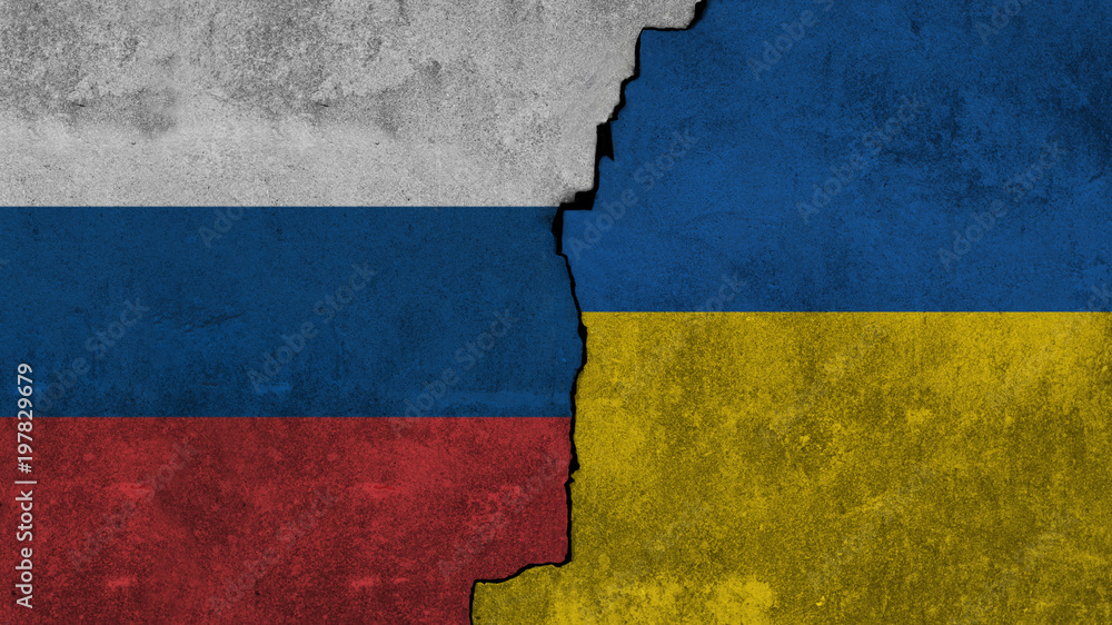flags of Russia and Ukraine painted on the wall. Stock Photo | Adobe Stock
