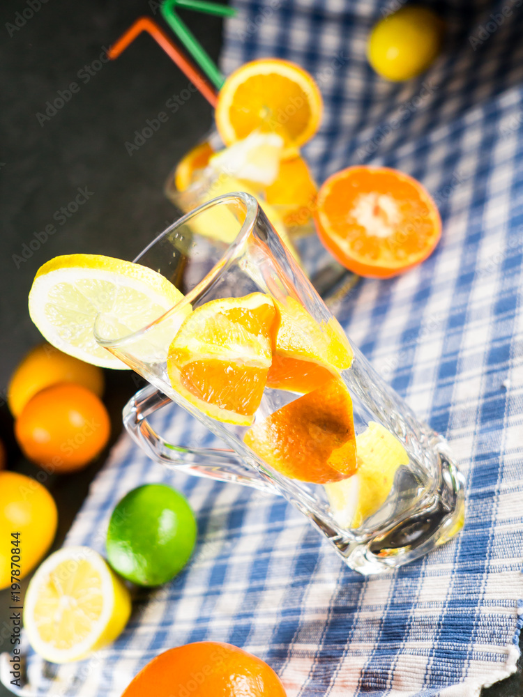 Fresh and juicy citrus fruits are ready for preparing of ice cold ...