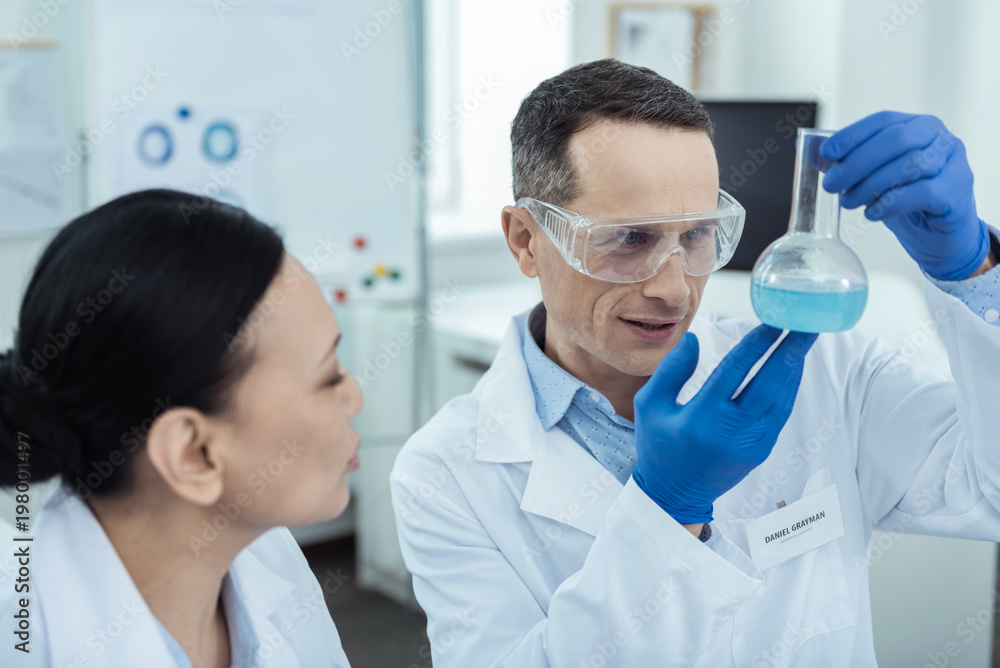 Great research. Alert intelligent experienced scientists smiling and ...