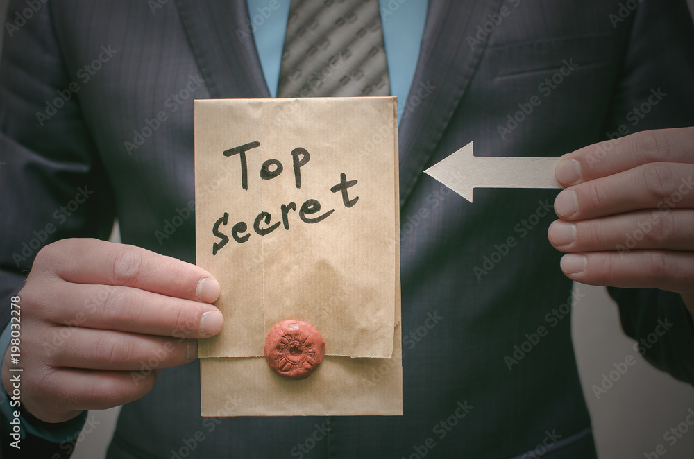 Top secret concept. Top secret documents or message in businessman ...