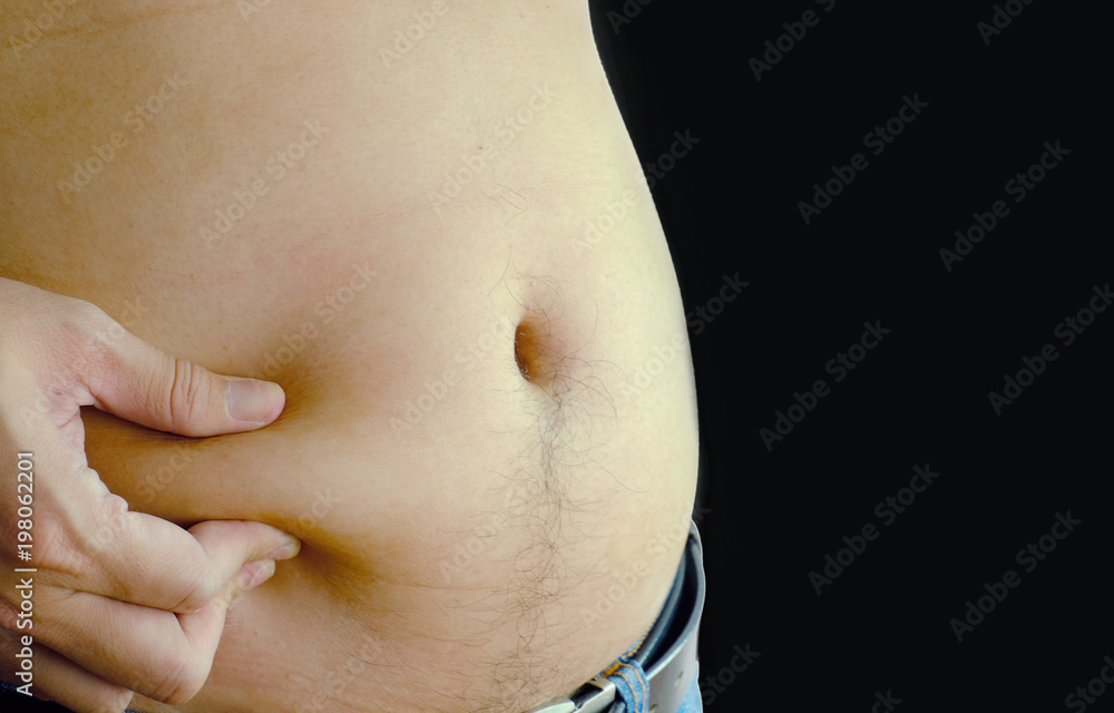 Belly fat man wear jean with black background Stock Photo | Adobe Stock
