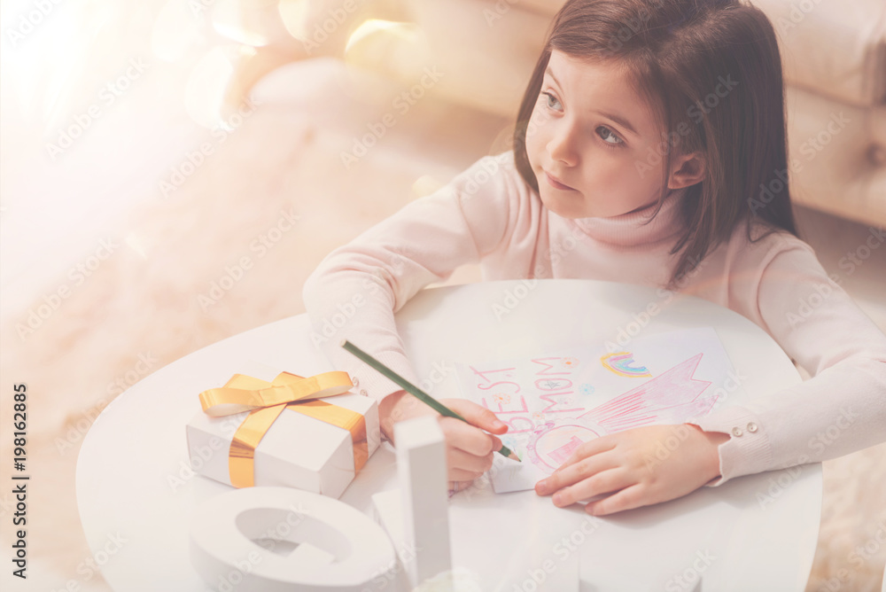 Cuteness on its best. Diligent bright loving child feeling inspired ...