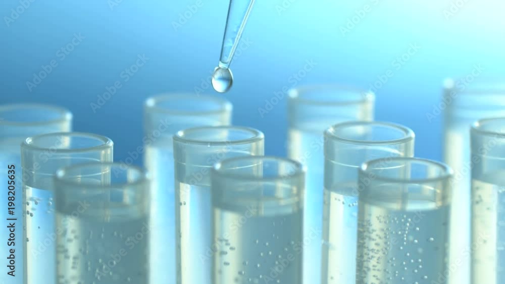 a scientist with a pipette analyzes a colored liquid to extract the DNA ...