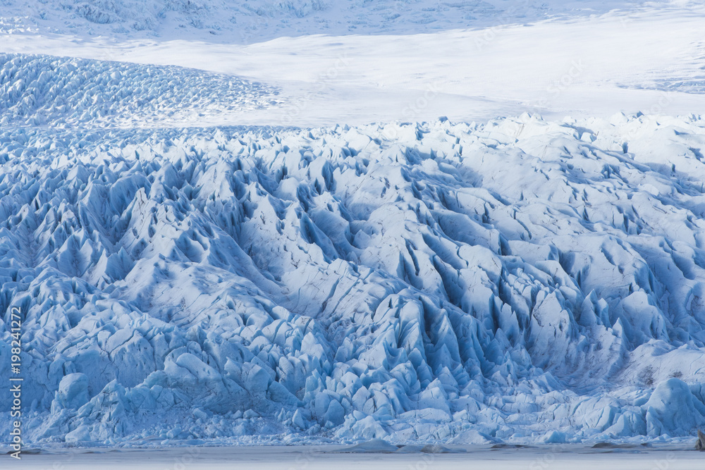 Detailed photo of the Icelandic glacier ice with a incredibly vivid ...