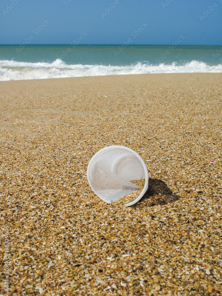 Sand In A Cup Of Water