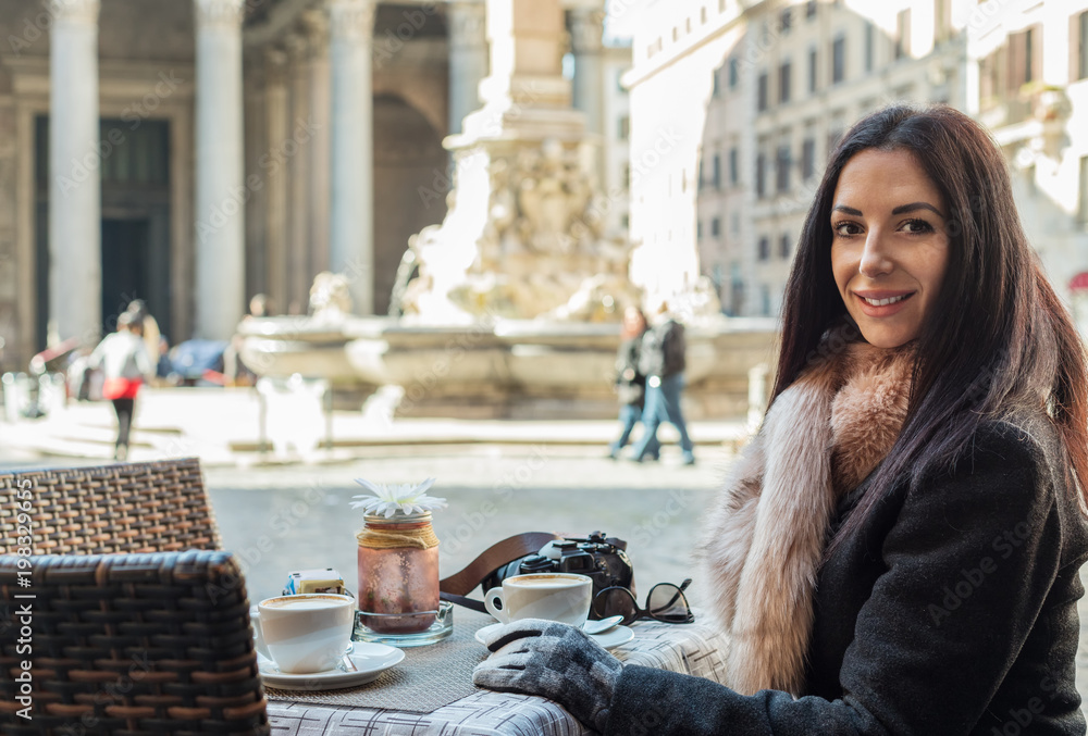 Happy woman in the morning sitting street cafe in Rome in front of ...
