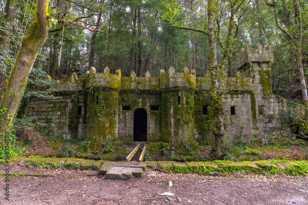 Small castle walls near a medieval aqueduct - Aldan - Spain Stock Photo ...