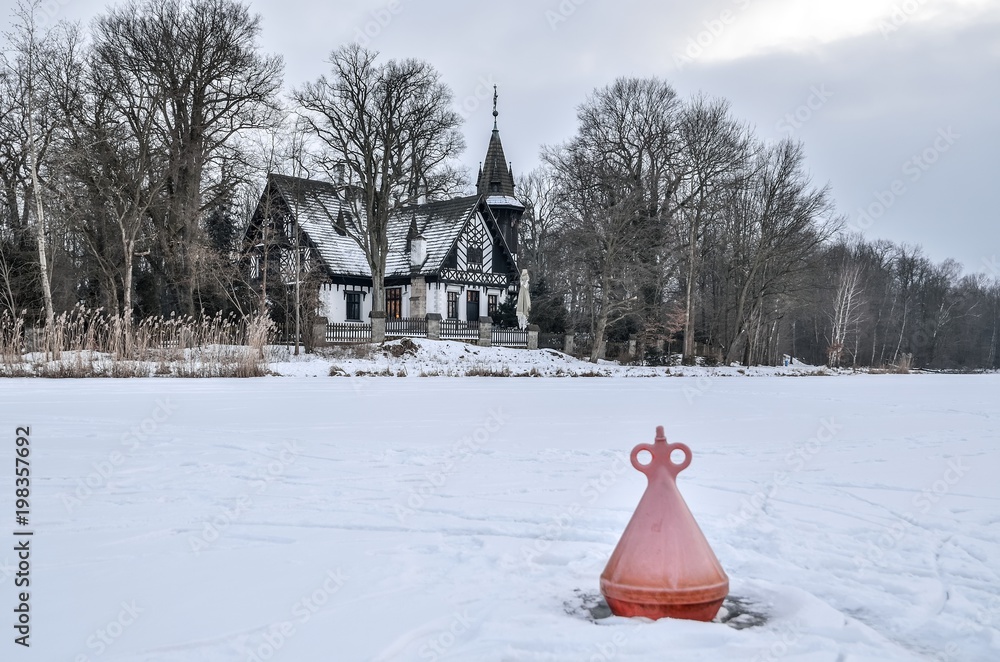 Beautiful historic castle in a winter scenery. Historic Hunting Palace ...