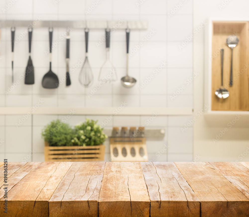 Wood table top on blur kitchen room background Stock Photo | Adobe Stock