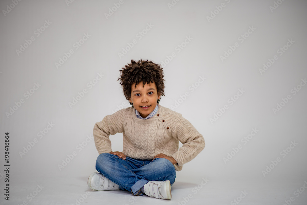 cute Lovely dark-skinned boy with age 6 years in different clothes ...