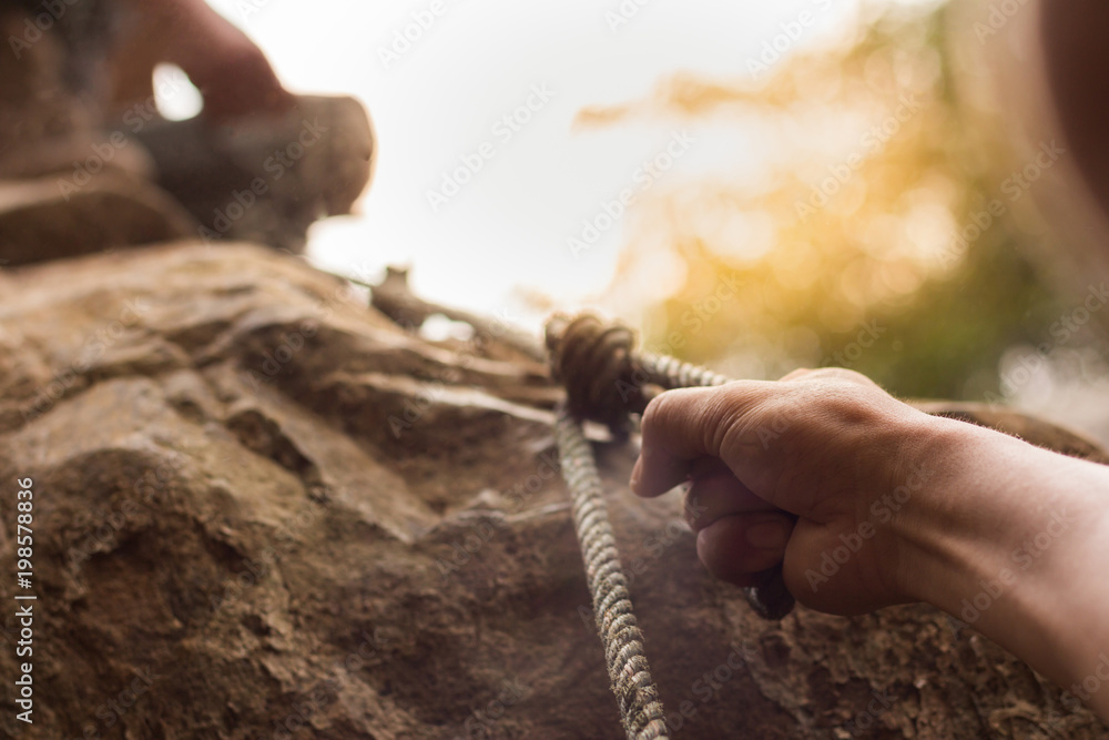 men climbing on rock outdoor, close-up image of climber hand Stock ...