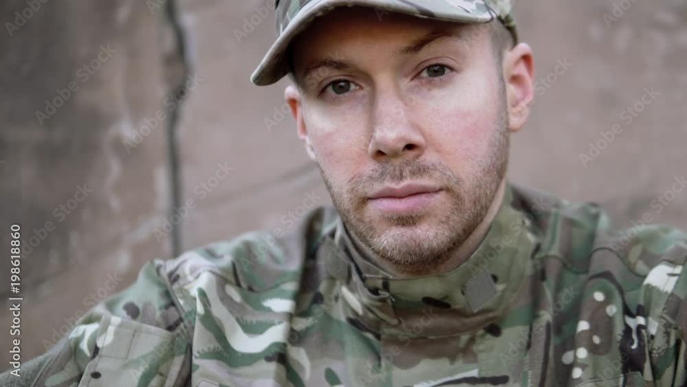 Portrait Of Sad, Tired Young Army Soldier Struggling With Mental Issues ...