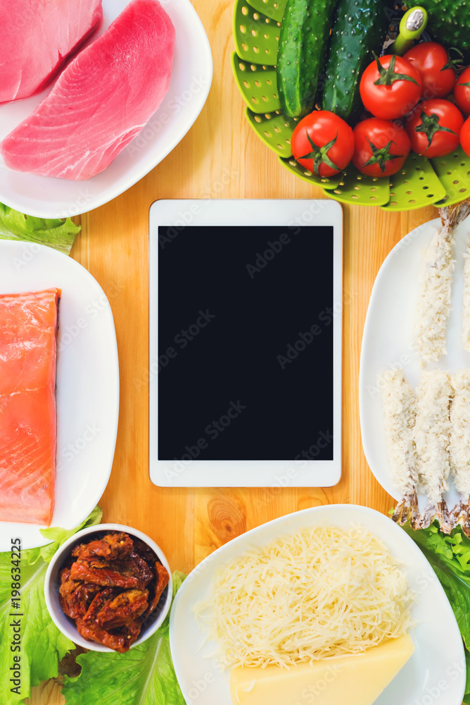 Still life on a wooden table lie products between which the center is a ...