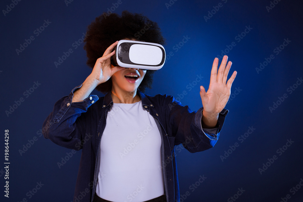 Always imagine! Curious attractive young girl smiling after having seen ...