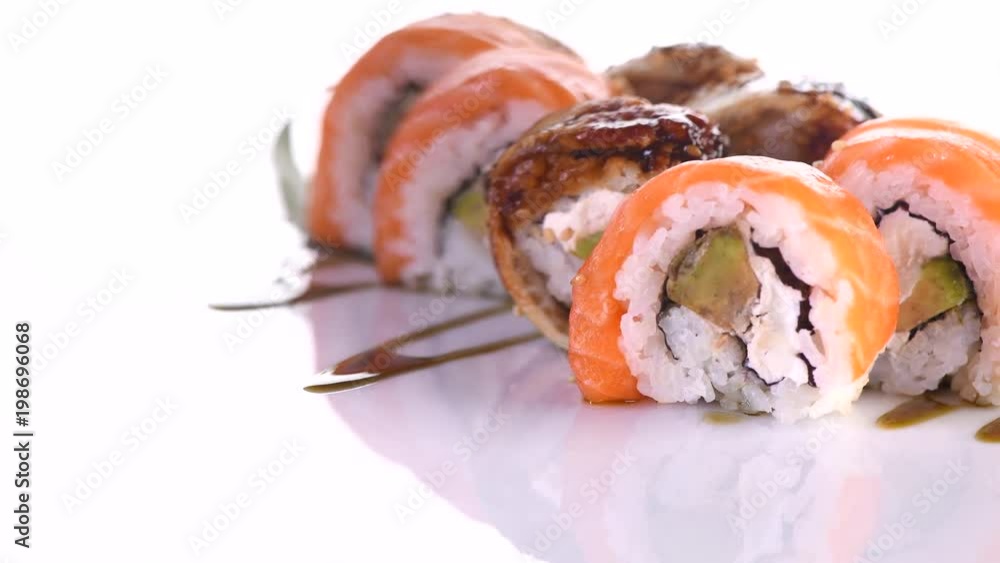 Vidéo Stock Sushi roll set on white background. Rotated California set ...