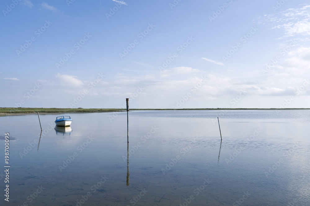 Laesoe / Denmark: Small fishing boat in the bay at Bloeden Hale Stock ...