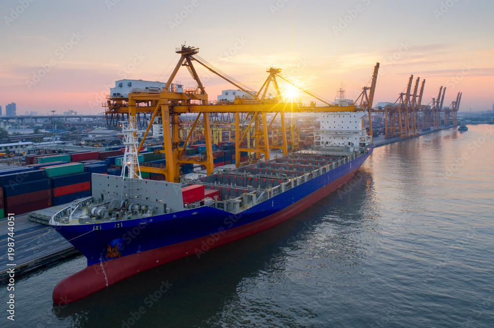Containers yard in port congestion with ship vessels are loading and ...