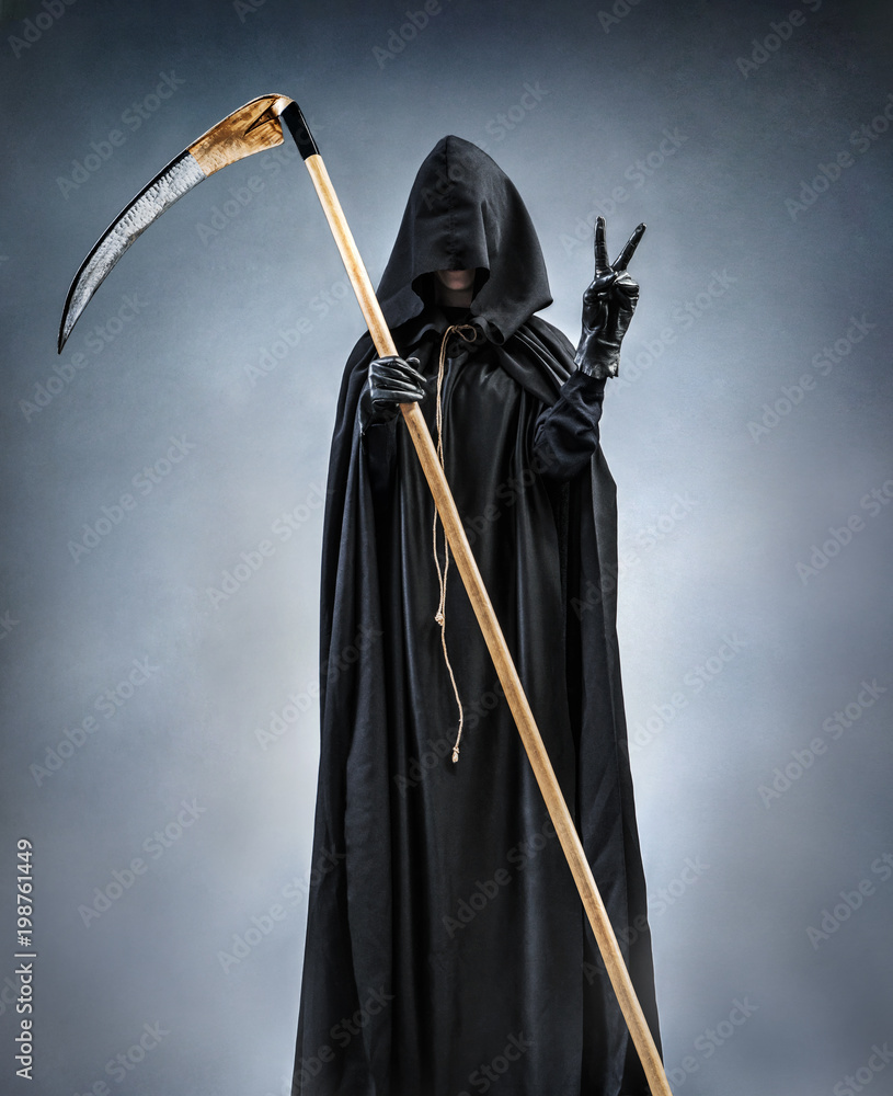 Grim Reaper showing Victory sign. Photo of silhouette grim reaper ...