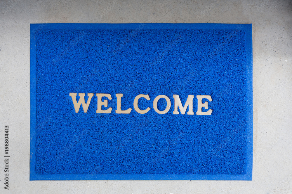 welcome blue carpet or door mat Stock Photo | Adobe Stock
