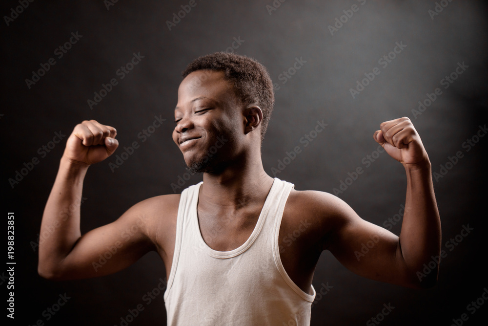 side view photo of Afro man with closed eyes and smiling showing his ...
