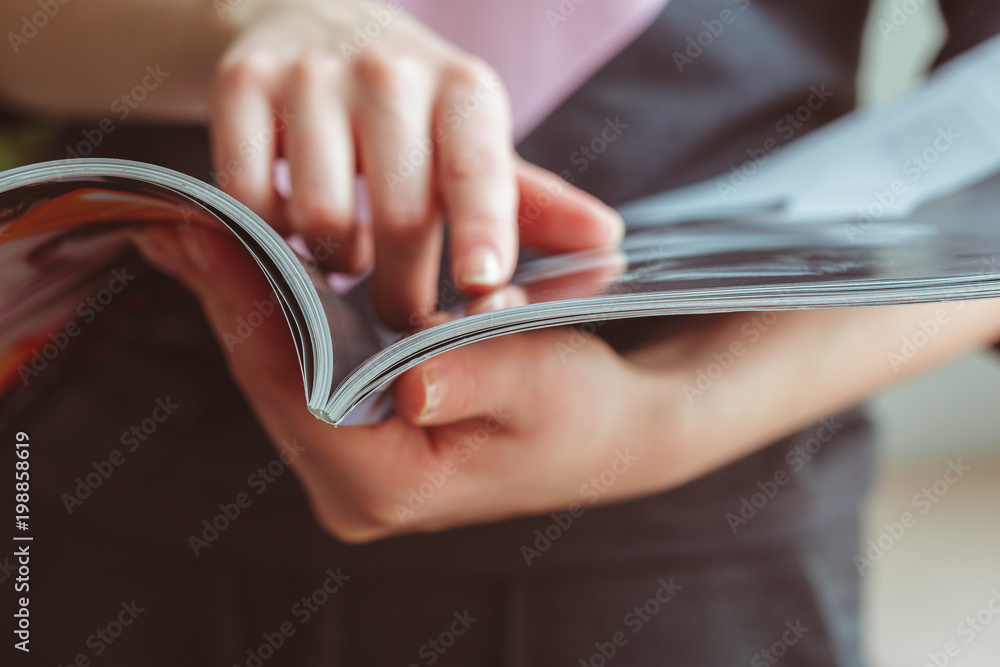 woman reading magazine at home Stock Photo | Adobe Stock