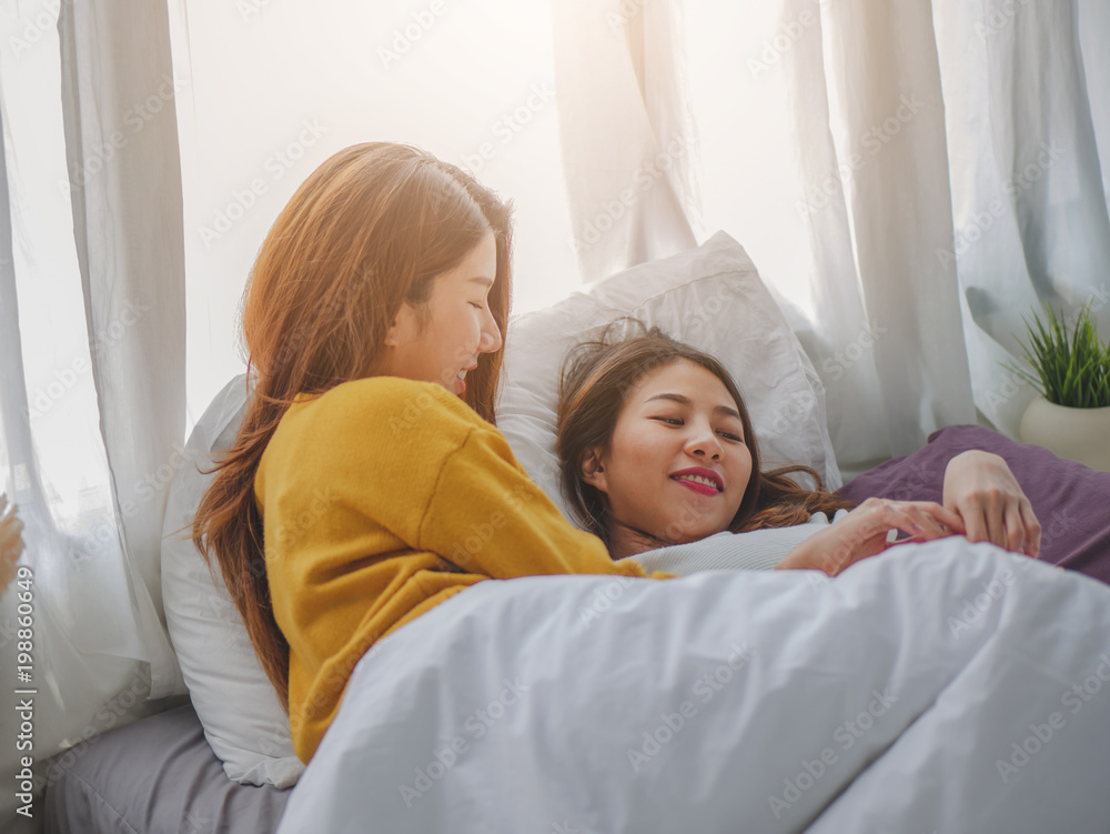 Young Asian Woman Lesbian Lovers Josh On Bedroom At Home Lesbian