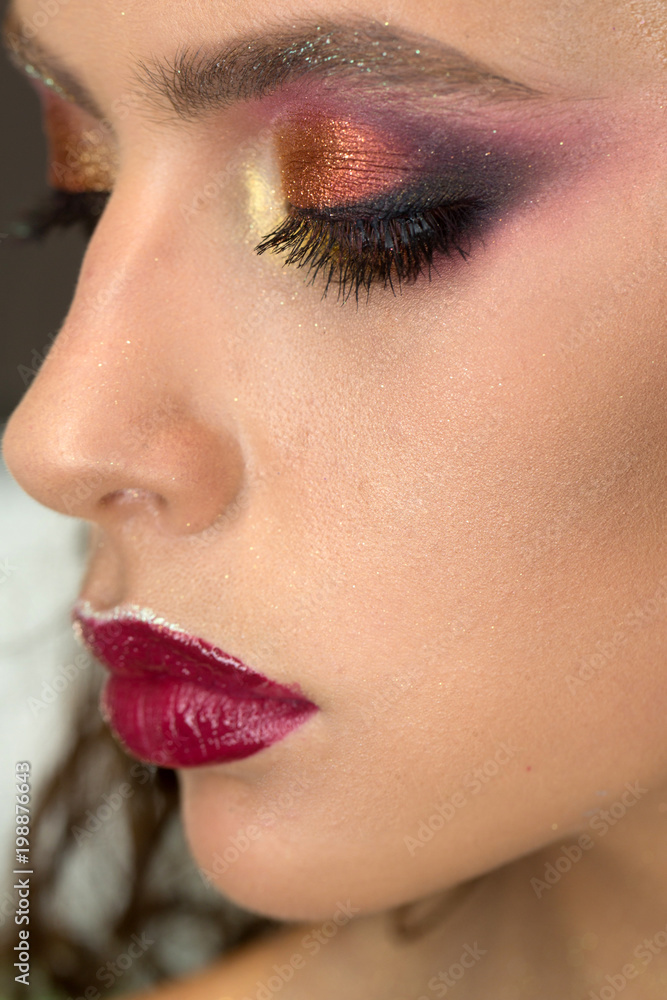 Woman with eye makeup and purple lips, beauty. Woman with young skin ...