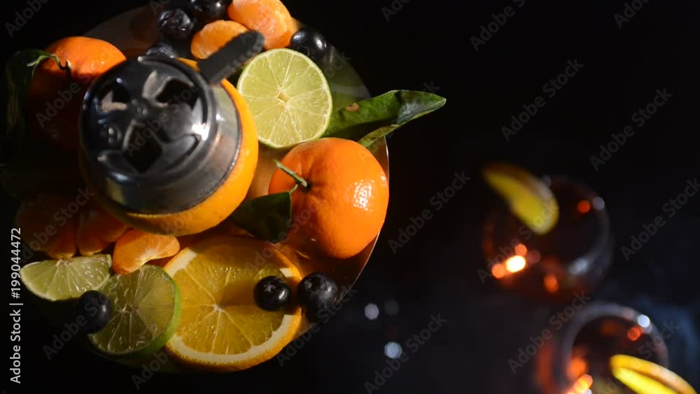 Modern fruit Hookah bowl with orange and a lot of fresh fruits with ...