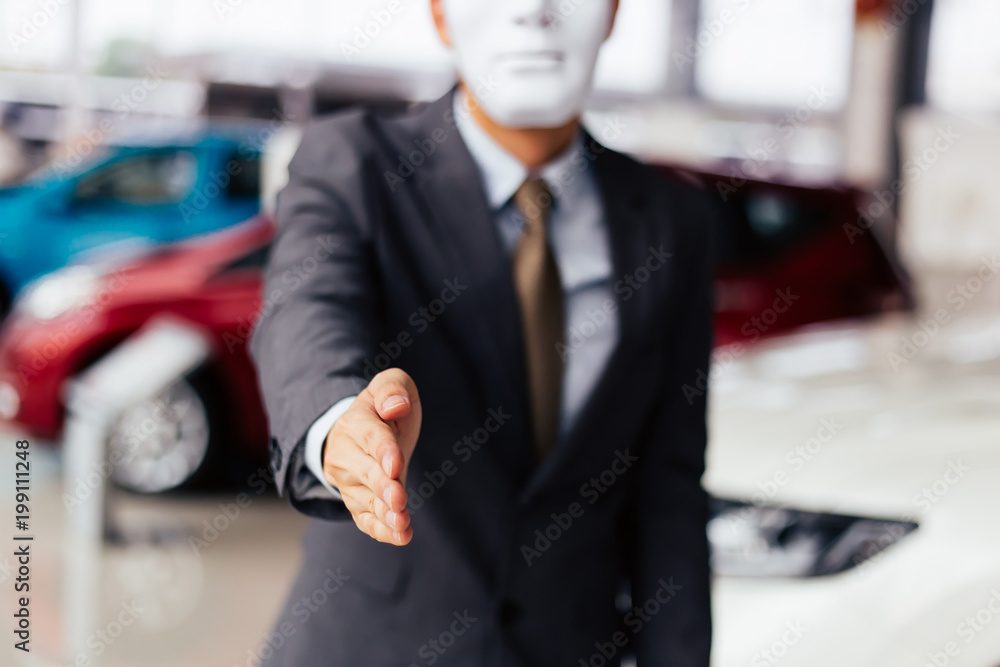 Dishonest and evil salesman in business suit in car dealership company ...