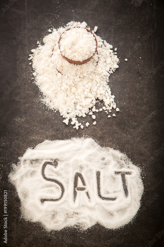 Spilled salt on dark background Stock Photo | Adobe Stock