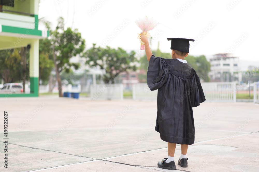 Congratulated kid graduate in school during commencement ,concept ...