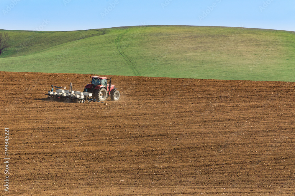 spring sowing in the field with modern mechanisms Stock Photo | Adobe Stock